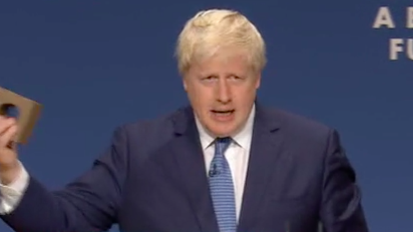 The moment Boris Johnson brandished a brick during his Conference ...
